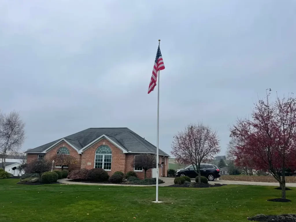 Custom Home Flagpole Installation - Liberty Flies